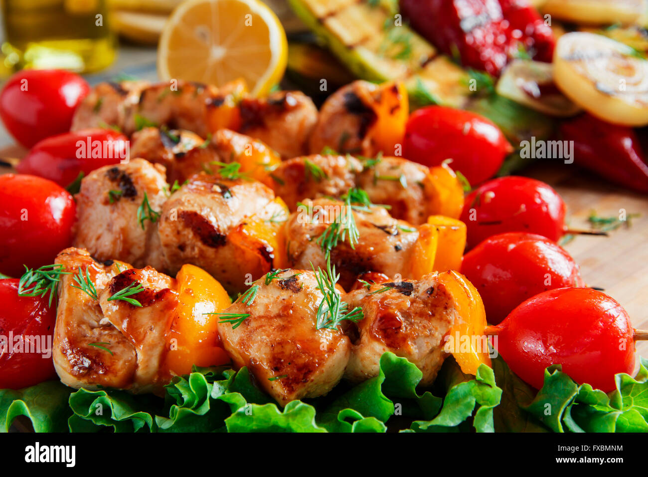 chicken kebab skewer with grilled vegetables barbecue Stock Photo - Alamy