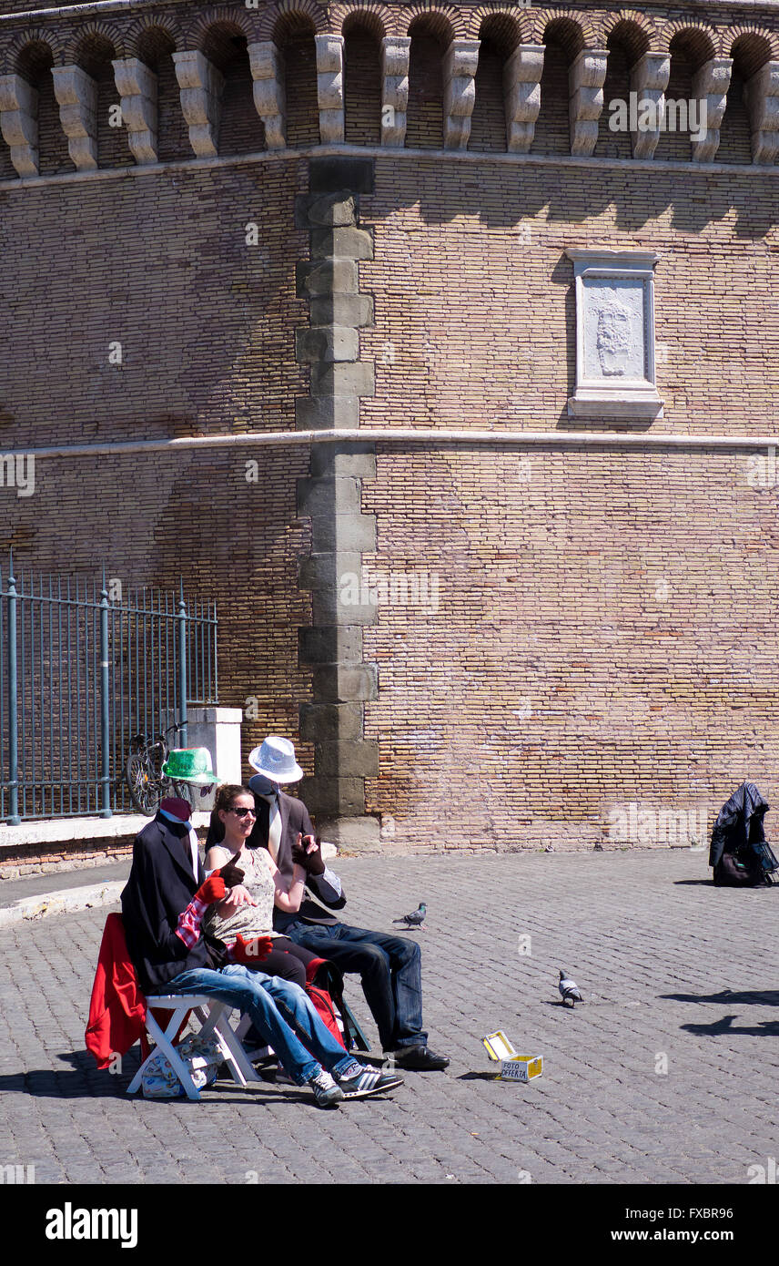 Woman tourist has picture taken with invisible men street performers in ...