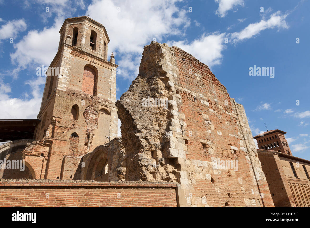 Sahagún, Spain: Bell tower of the Monastery of San Benito and the ruins ...