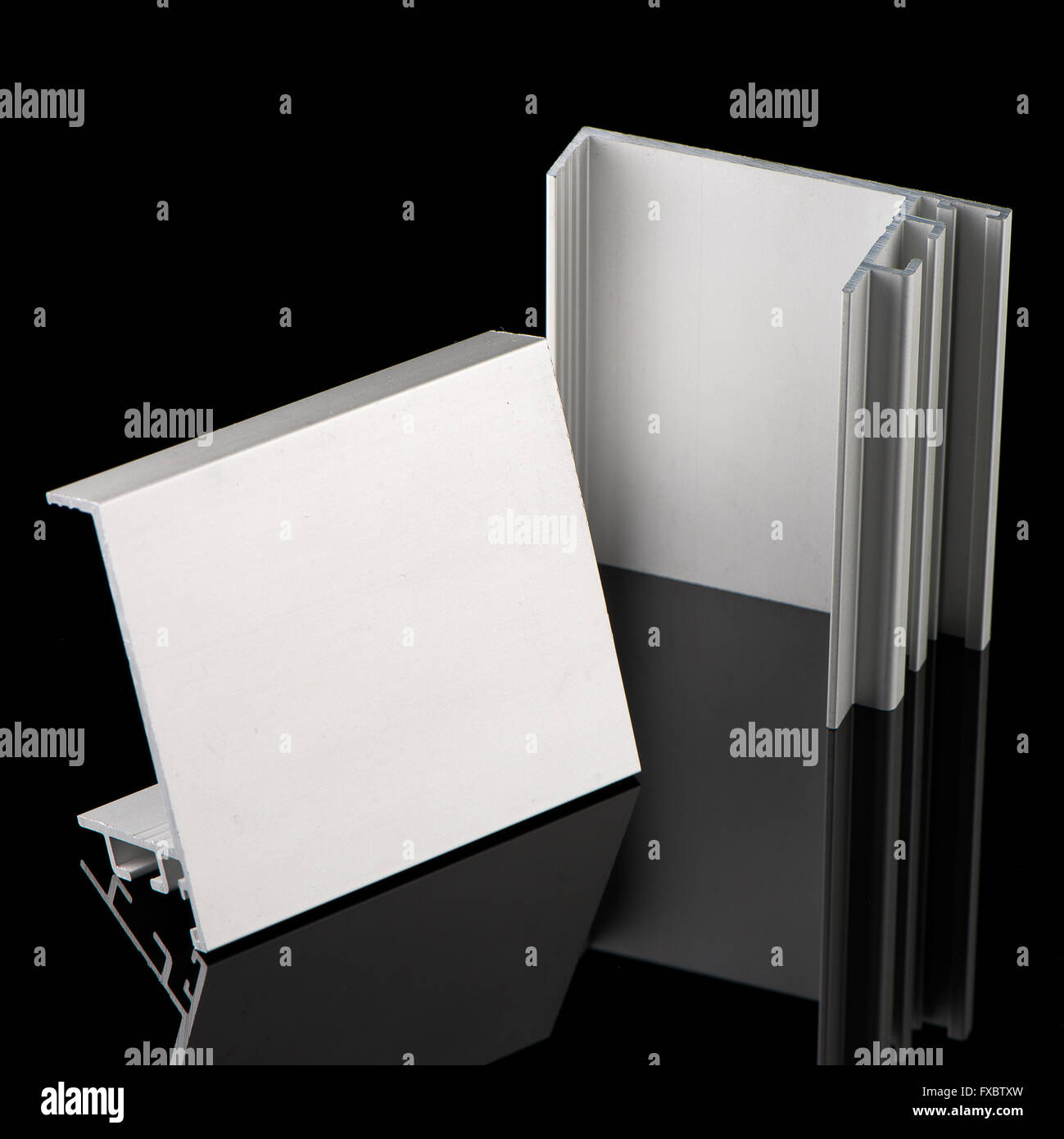 Aluminium profile sample isolated on black background Stock Photo - Alamy