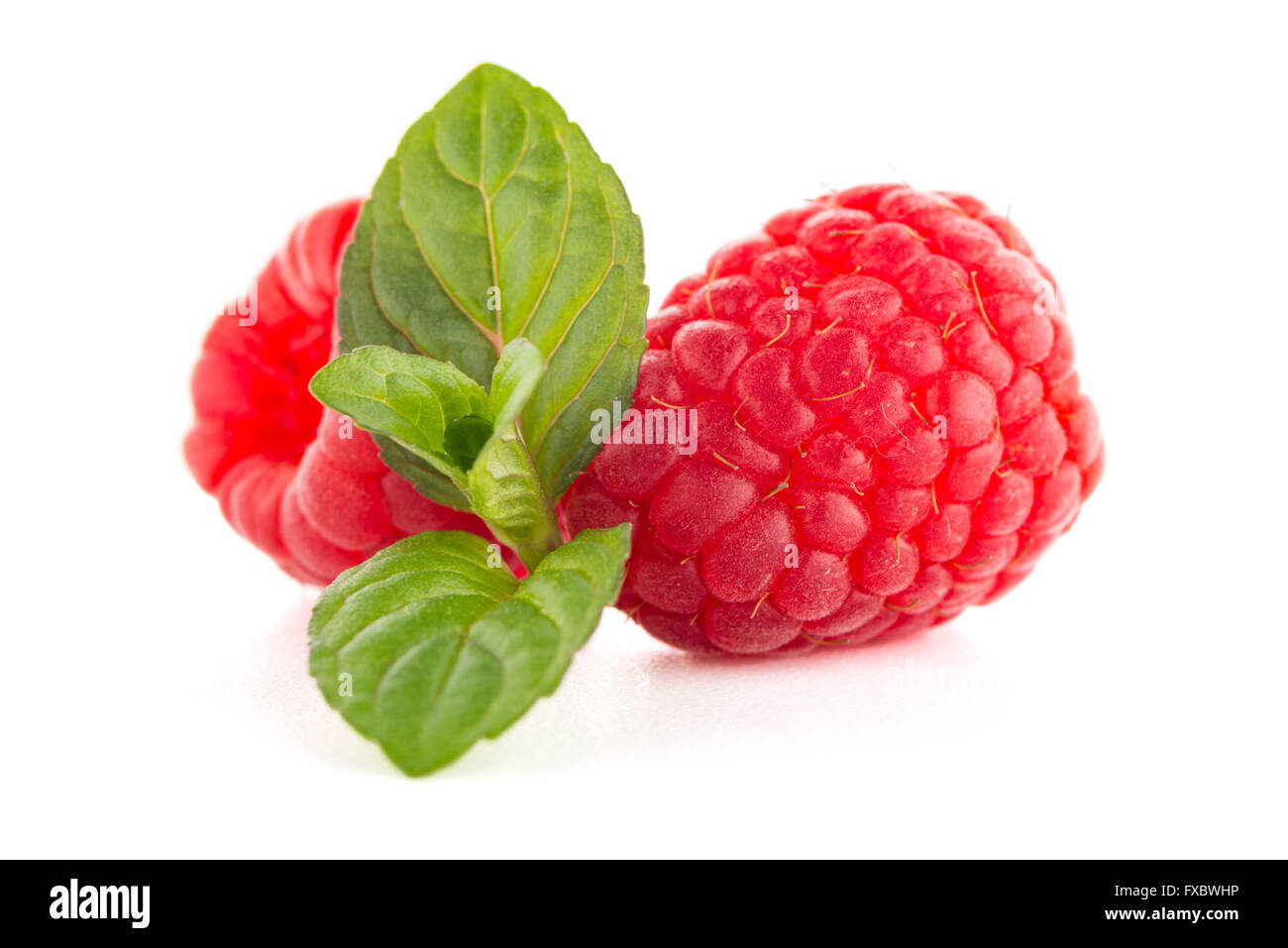 Raspberry fruit isolated over white background Stock Photo - Alamy