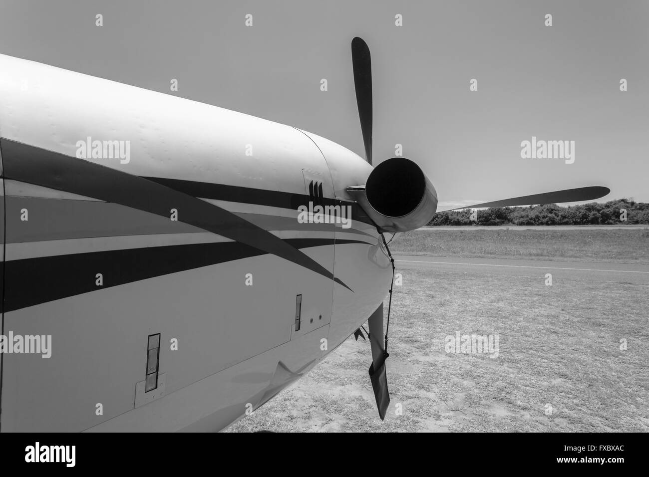 Plane aircraft closeup propellor exhaust engine section of twin ...