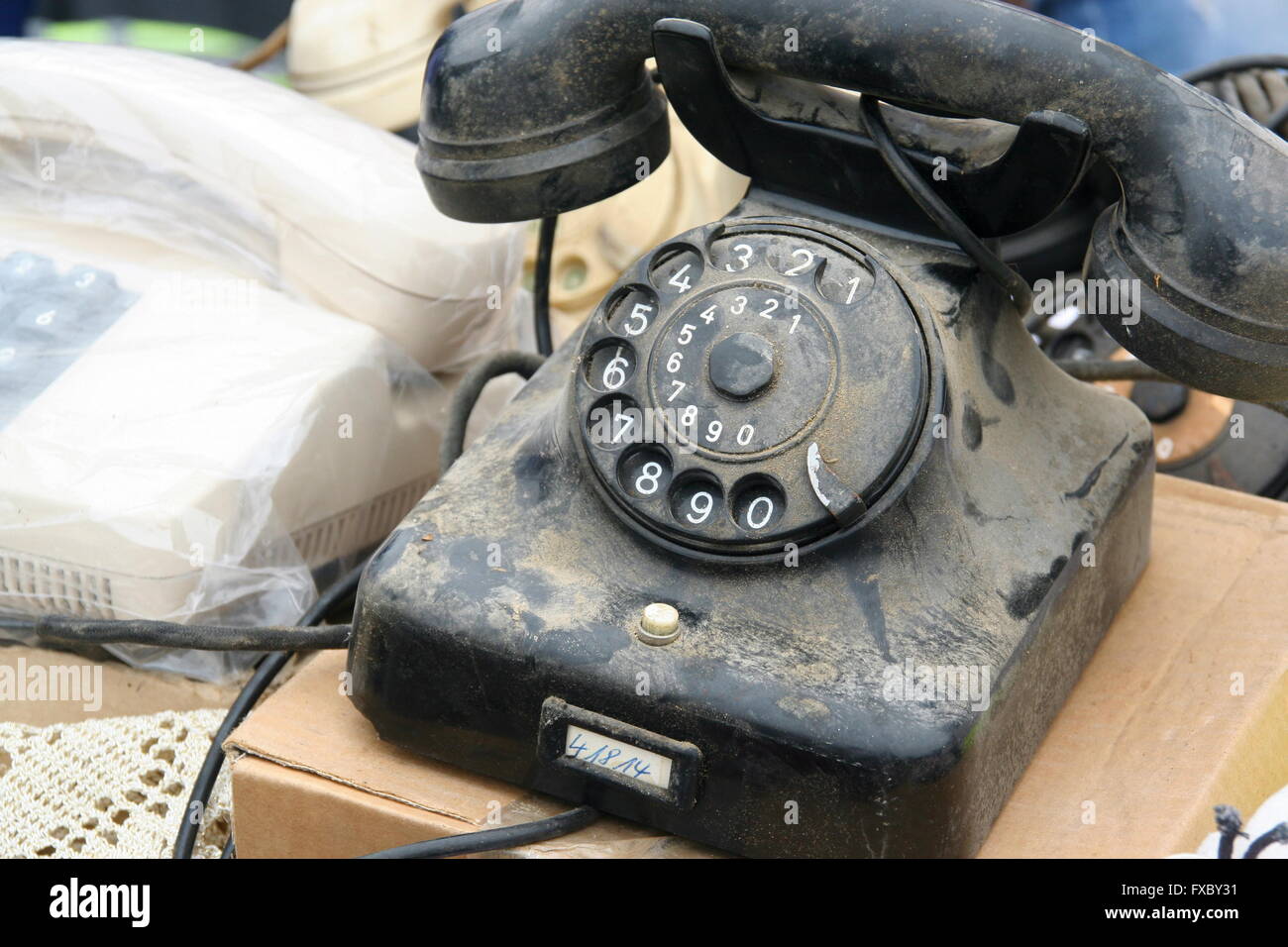 Old black rotary dial telephone, flea market, Germany Stock Photo - Alamy