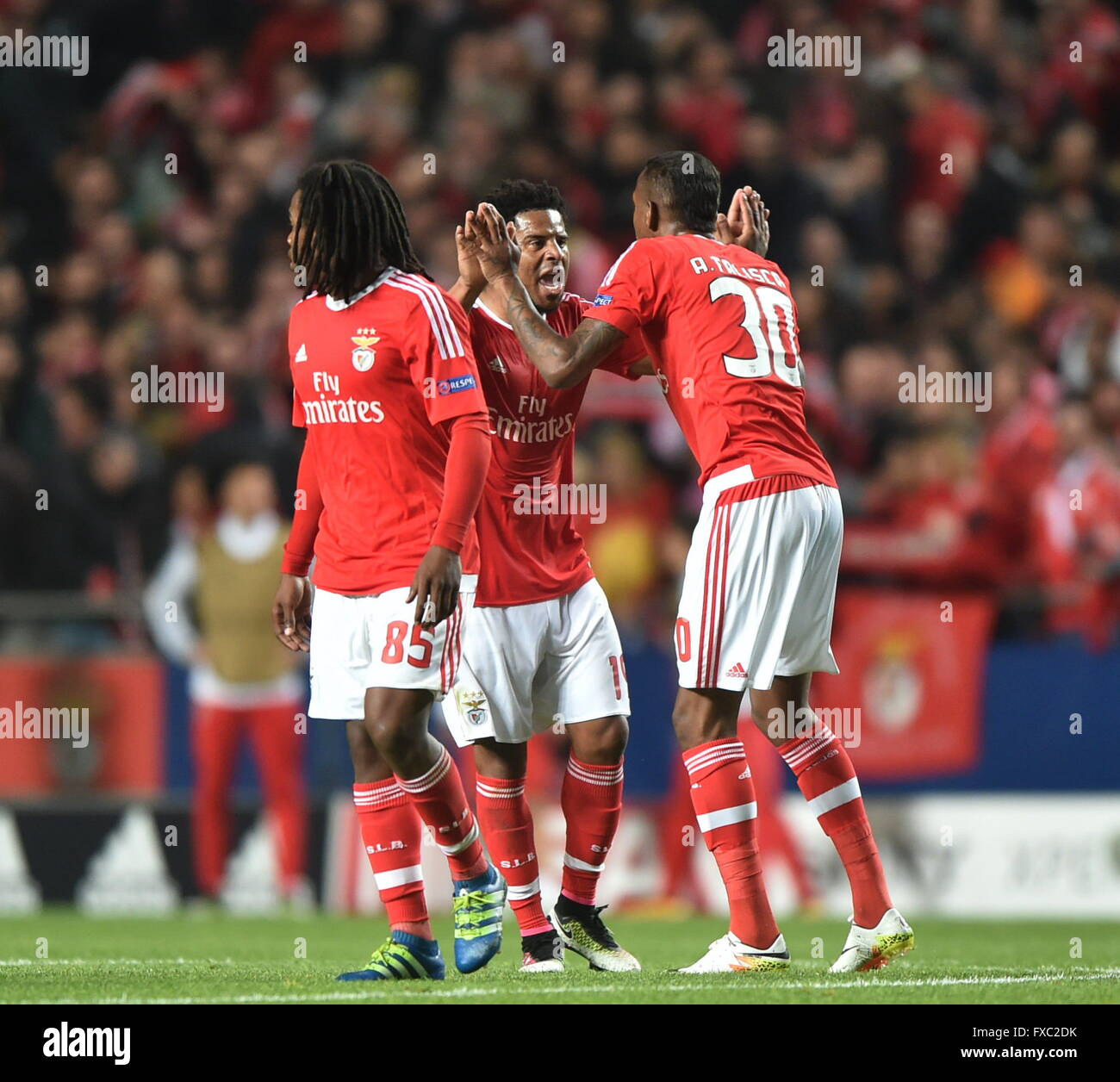 Lisbon. 13th Apr, 2016. SL Benfica's players celebrate after scoring a ...