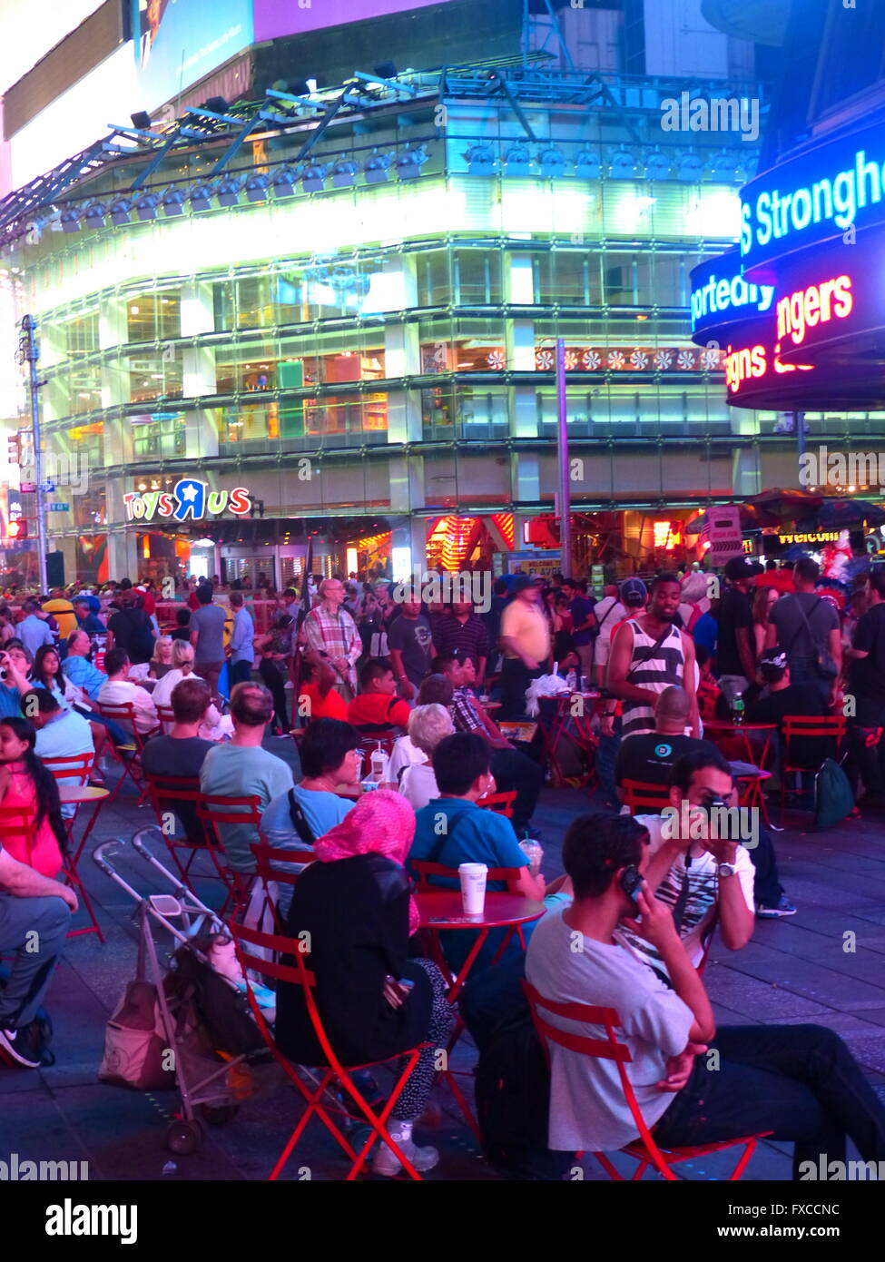 People sit on chairs at Times Square and relax Stock Photo - Alamy