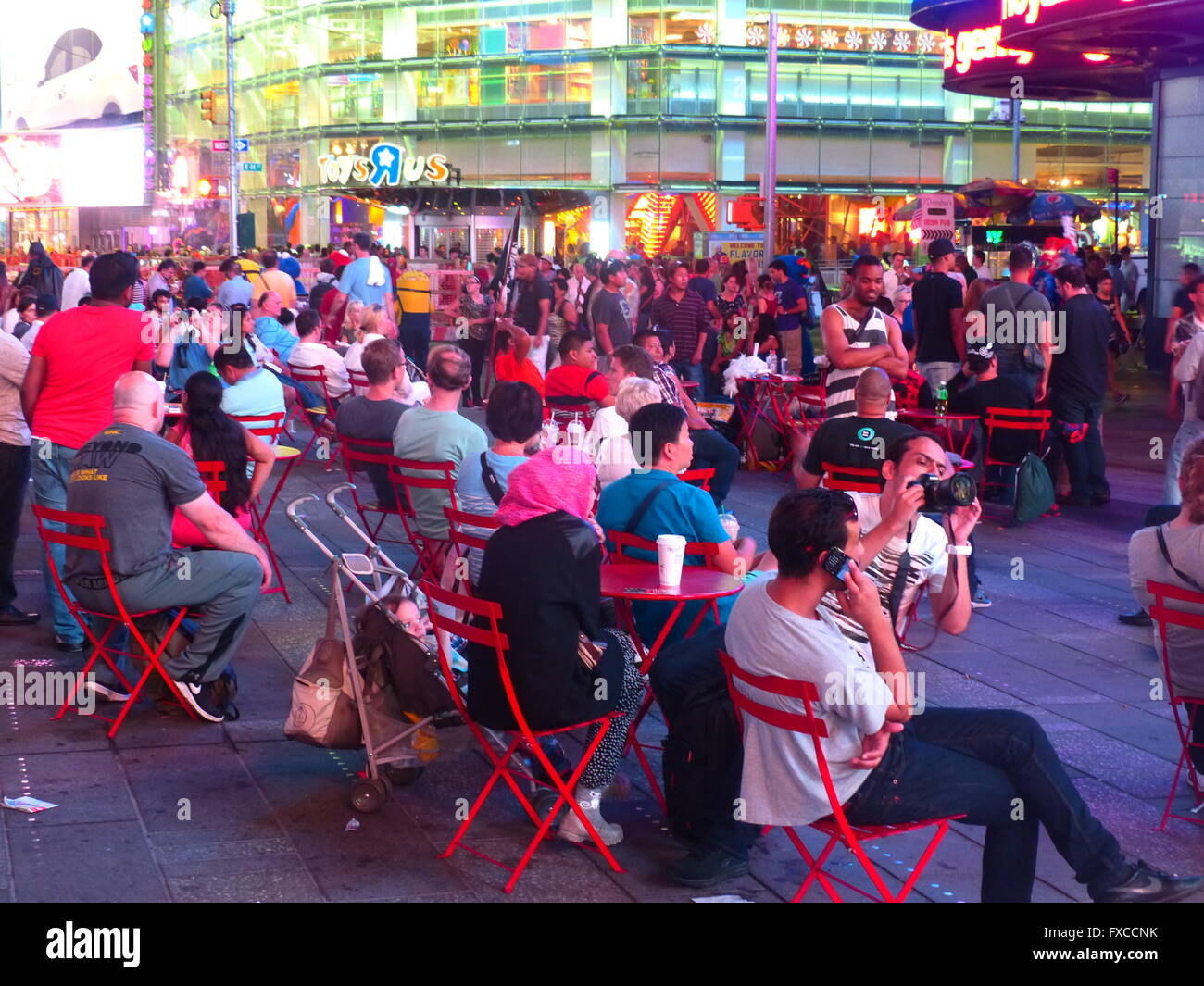 People sit on chairs at Times Square and relax Stock Photo - Alamy