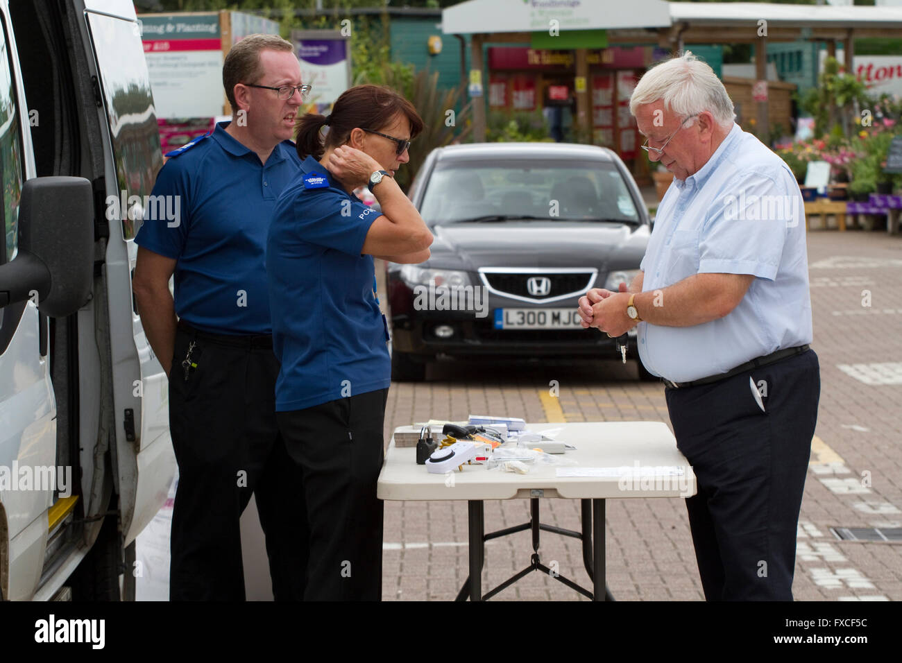 Female police officer helping public hi-res stock photography and ...