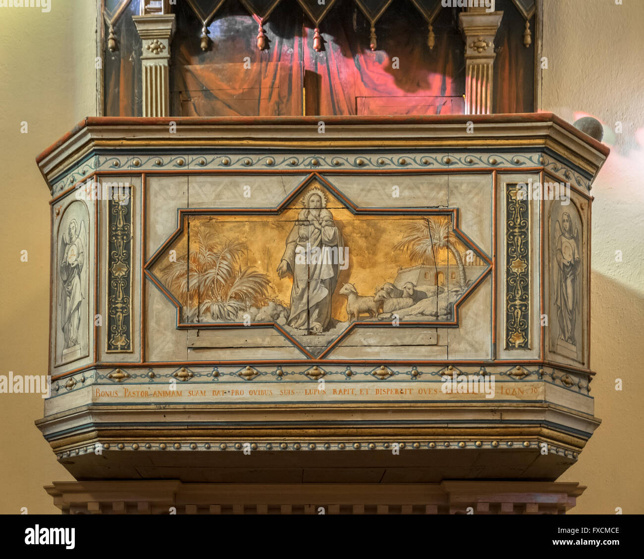 Detail of a pulpit with painted jesus shepherd of souls Stock Photo - Alamy
