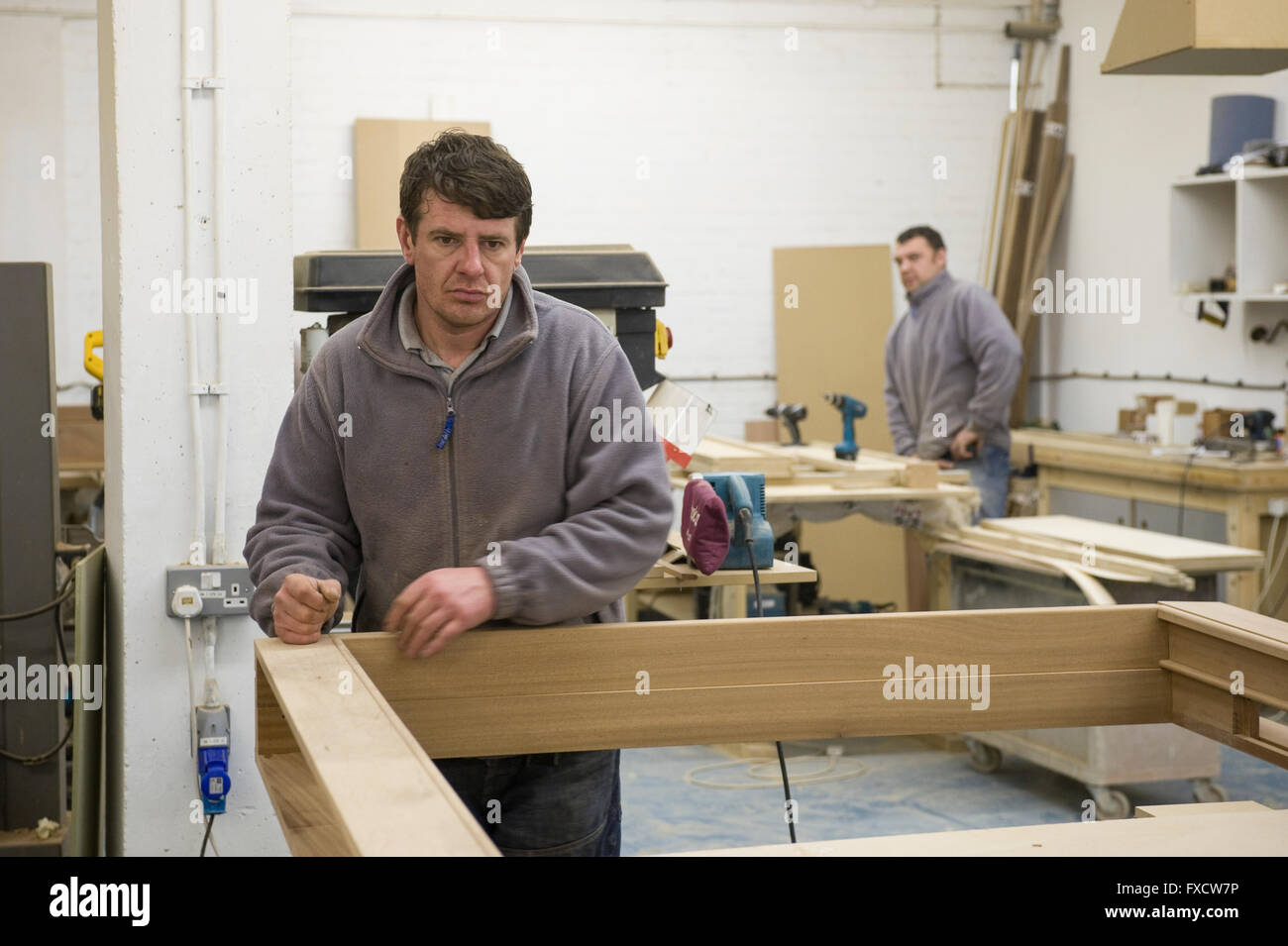 Craftsmen in a joinery factory Stock Photo - Alamy
