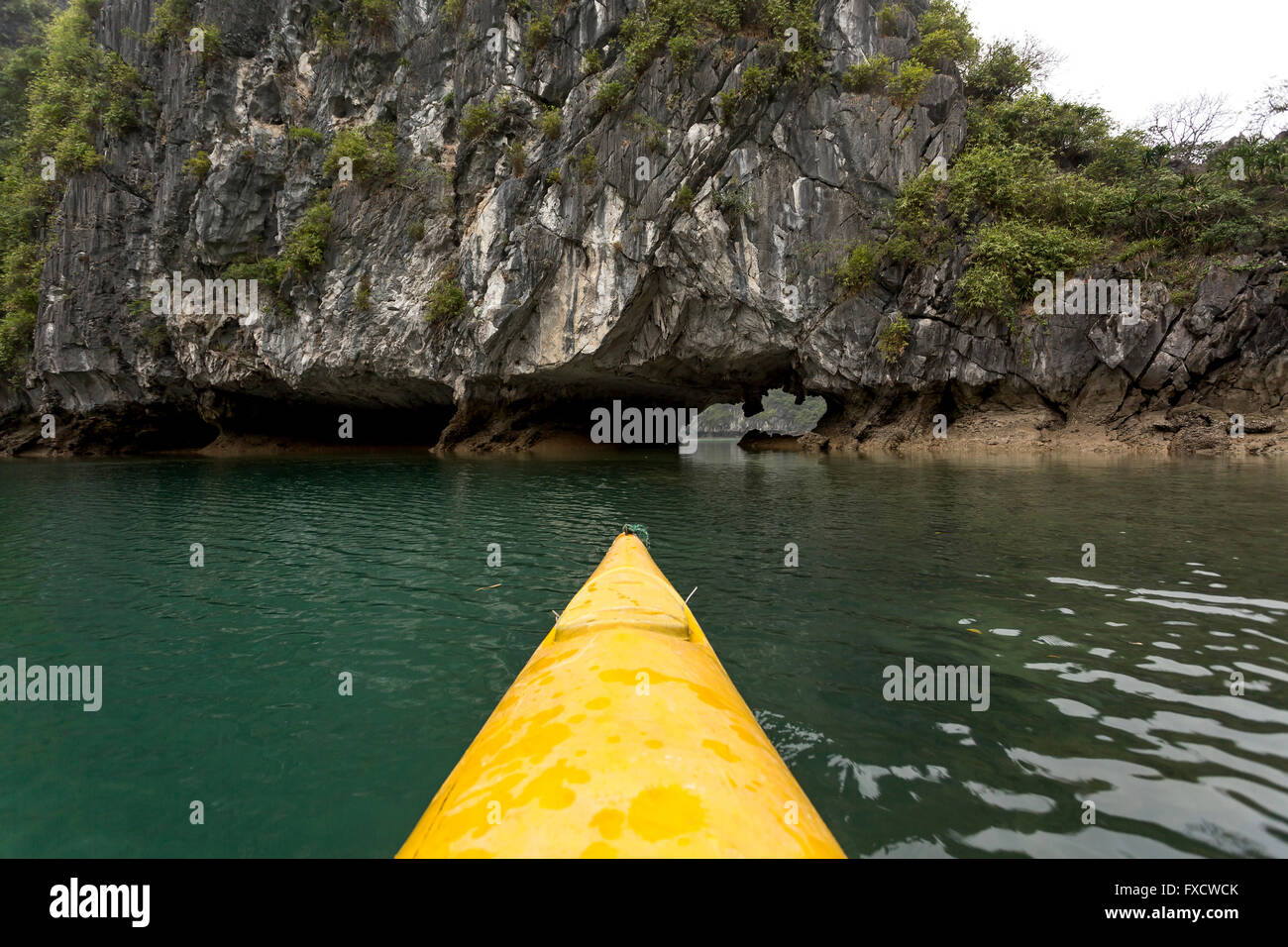 Yellow Kayak in Ha Long Bay Stock Photo - Alamy