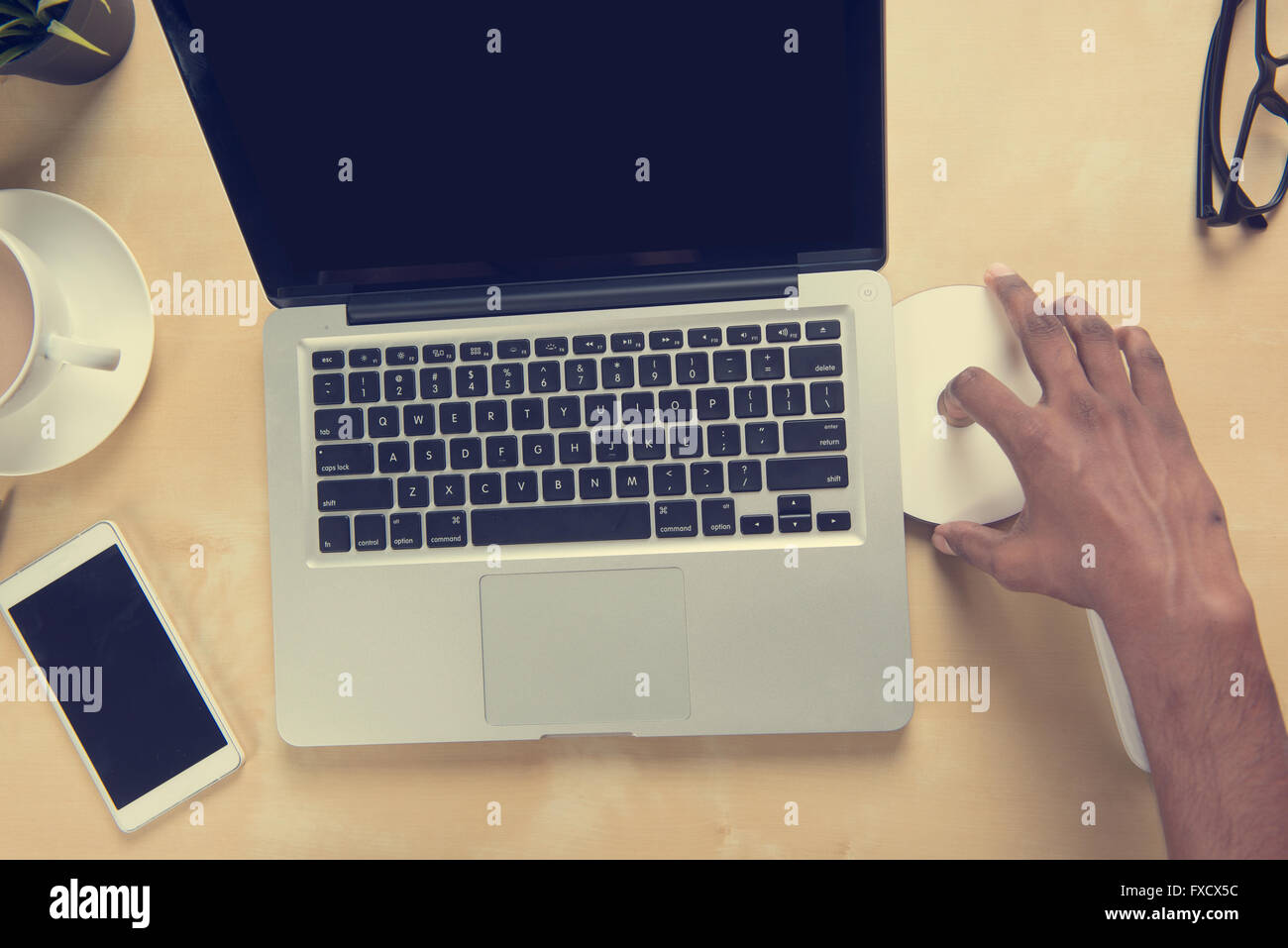 hand inserting dvd topview Stock Photo - Alamy