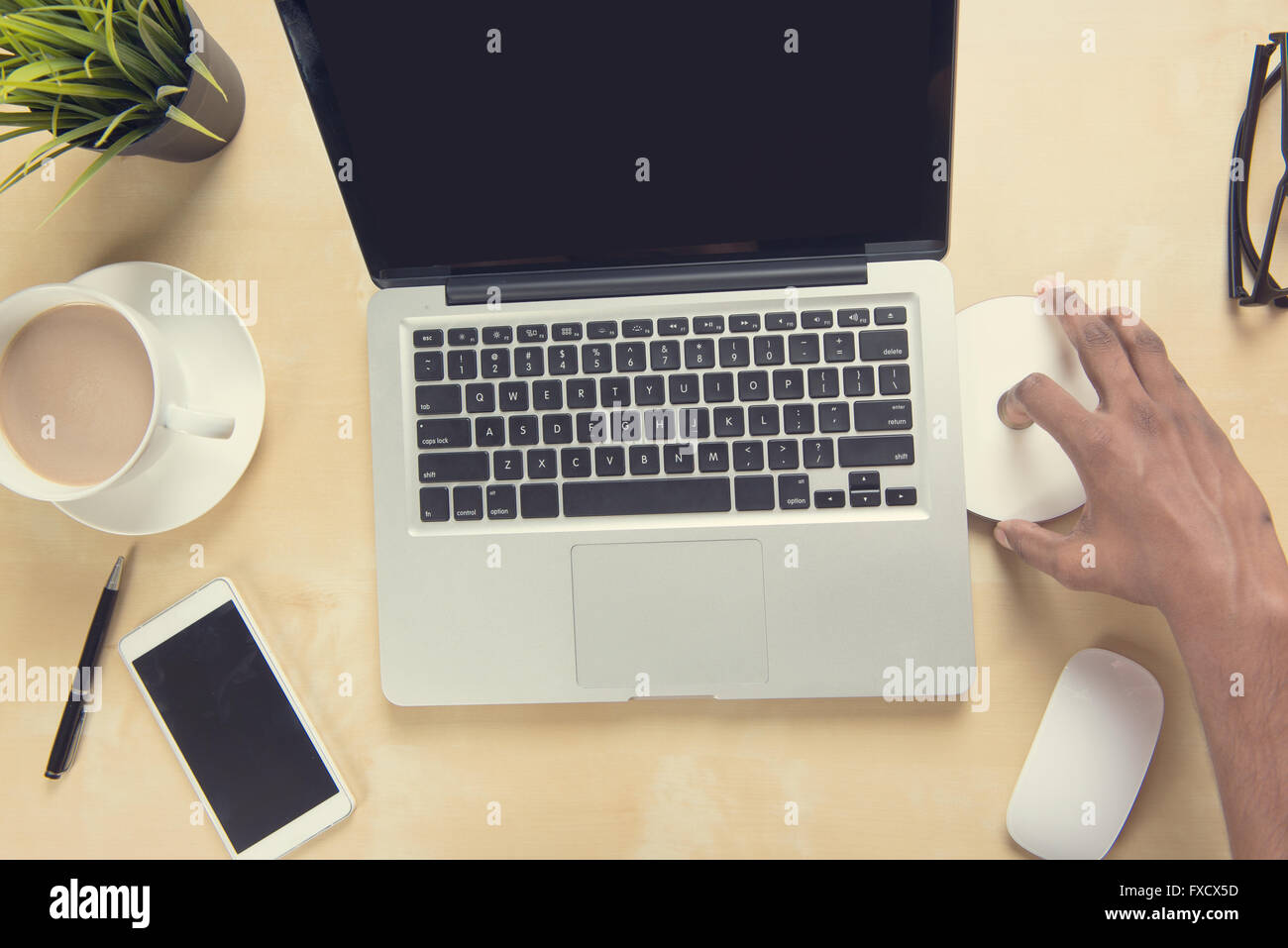 hand inserting dvd topview Stock Photo - Alamy