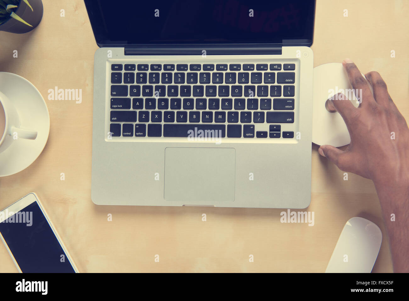 hand inserting dvd topview Stock Photo - Alamy