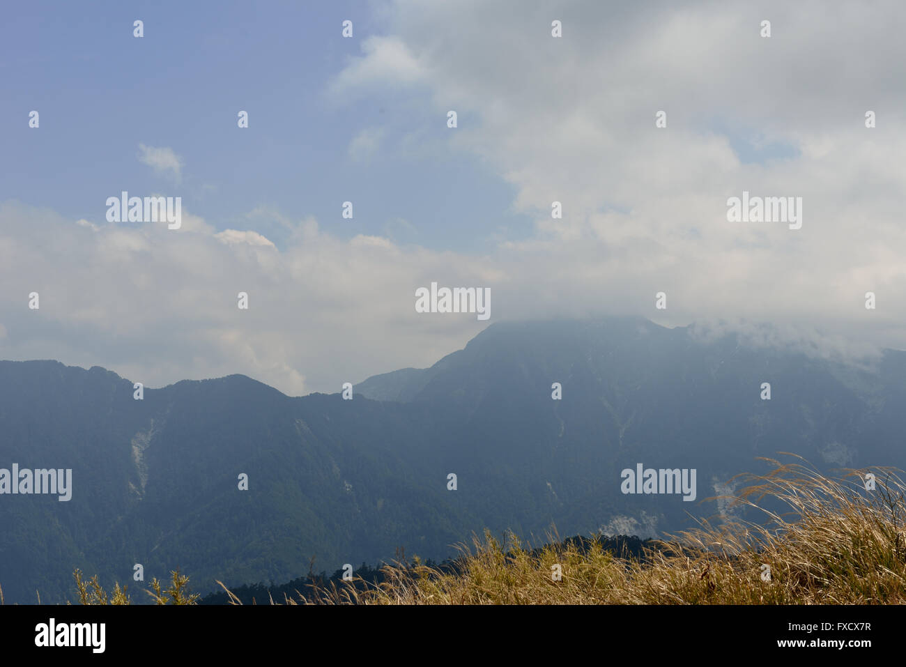The hill commands a fine distant view Stock Photo - Alamy
