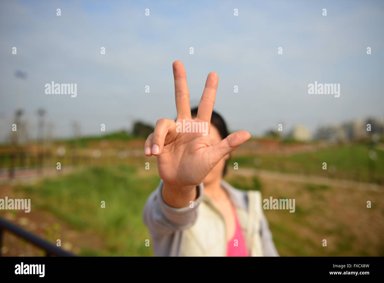 Hand sign of number eight hi-res stock photography and images - Alamy
