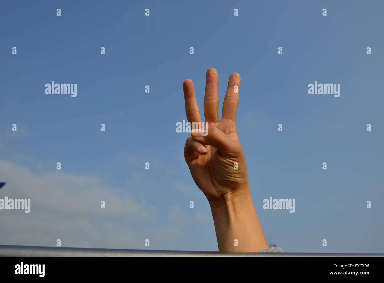 Number three gesture hi-res stock photography and images - Alamy