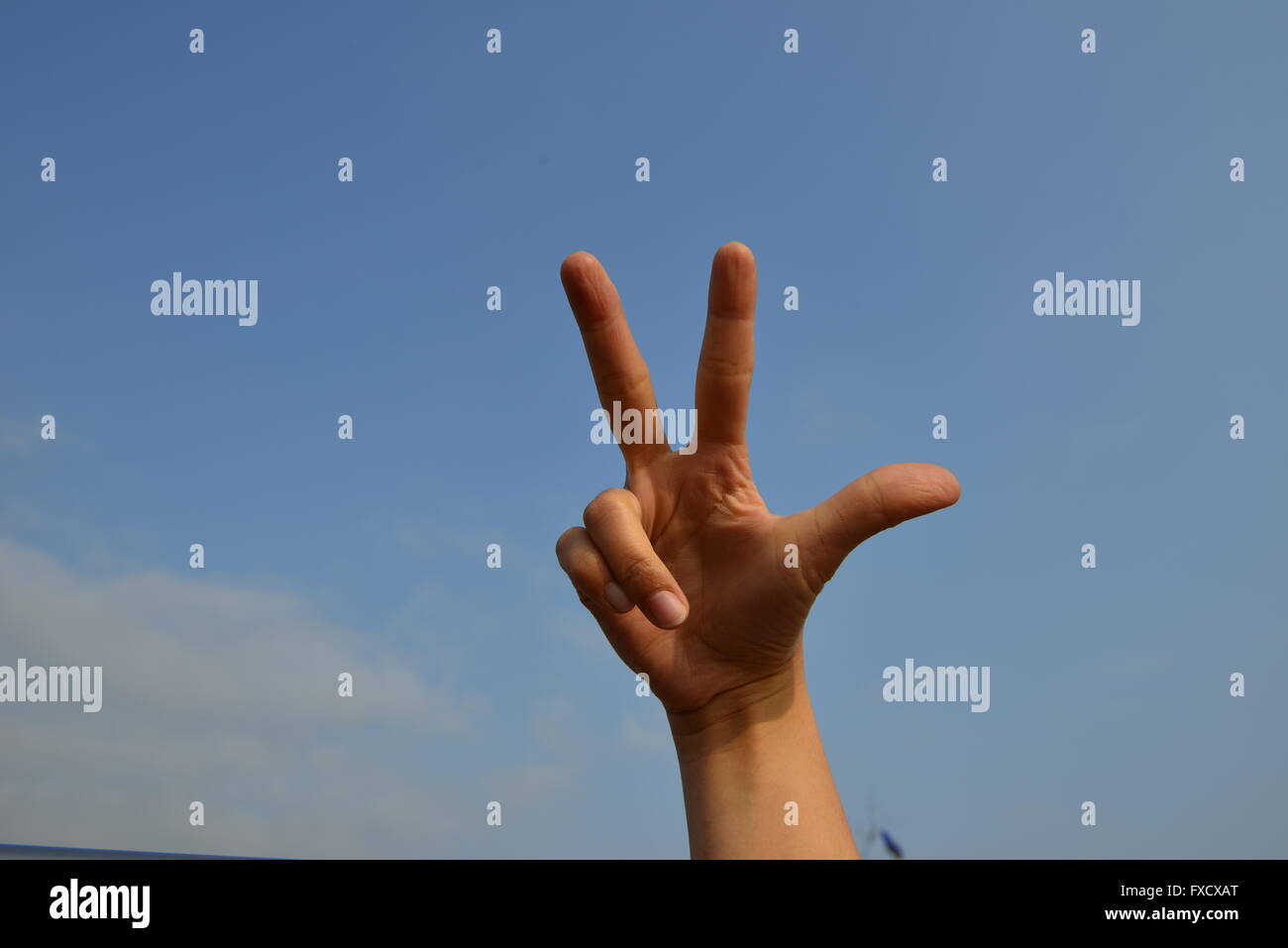 Hand sign of number eight hi-res stock photography and images - Alamy