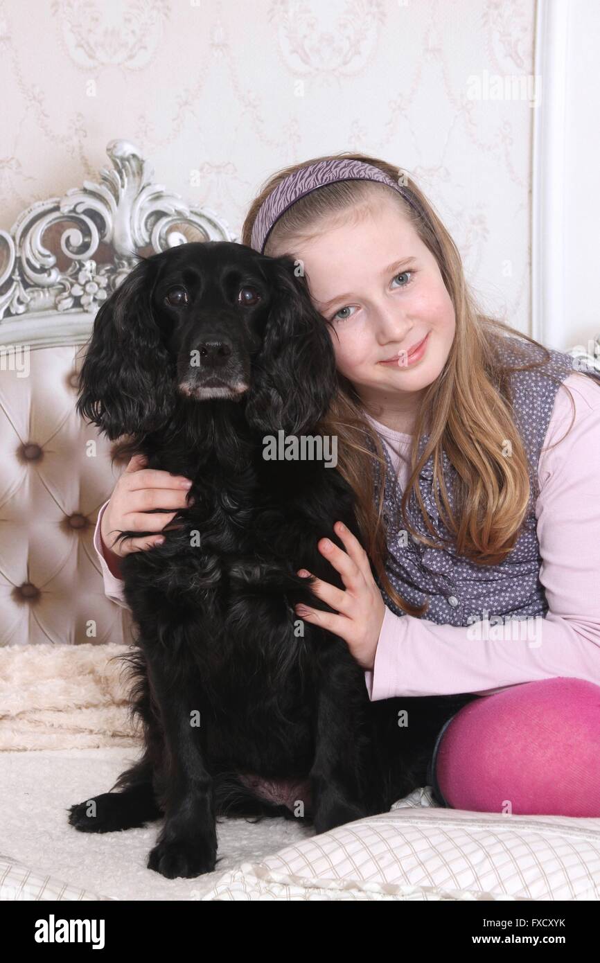 girl and Cocker-Spaniel-mongrel Stock Photo - Alamy