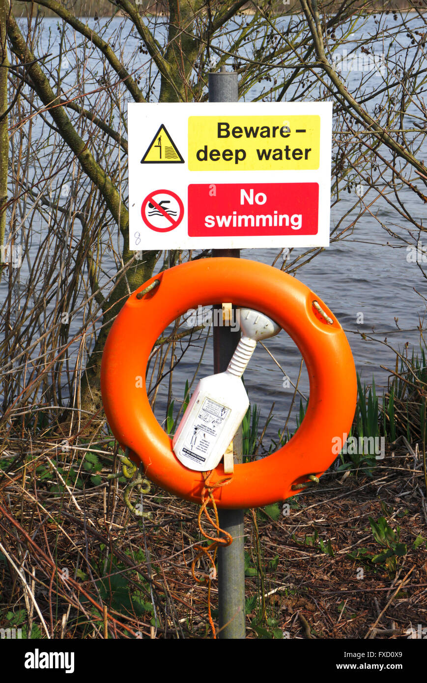 Lifebelt and line with hazards sign at Whitlingham Country Park, Trowse ...