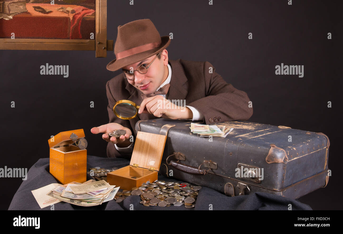 Numismatist with his coin collection Stock Photo - Alamy