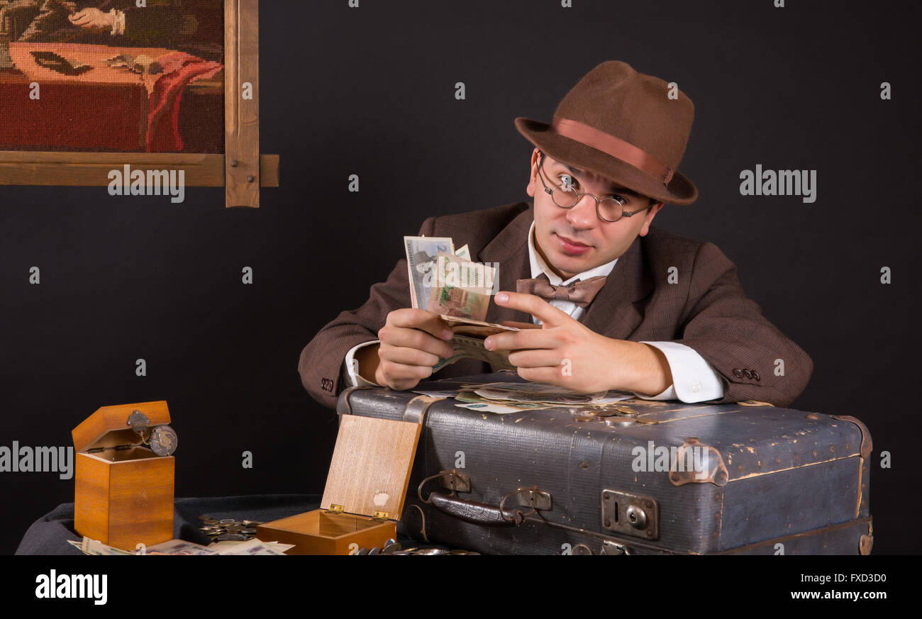 Numismatist with his coin collection Stock Photo - Alamy