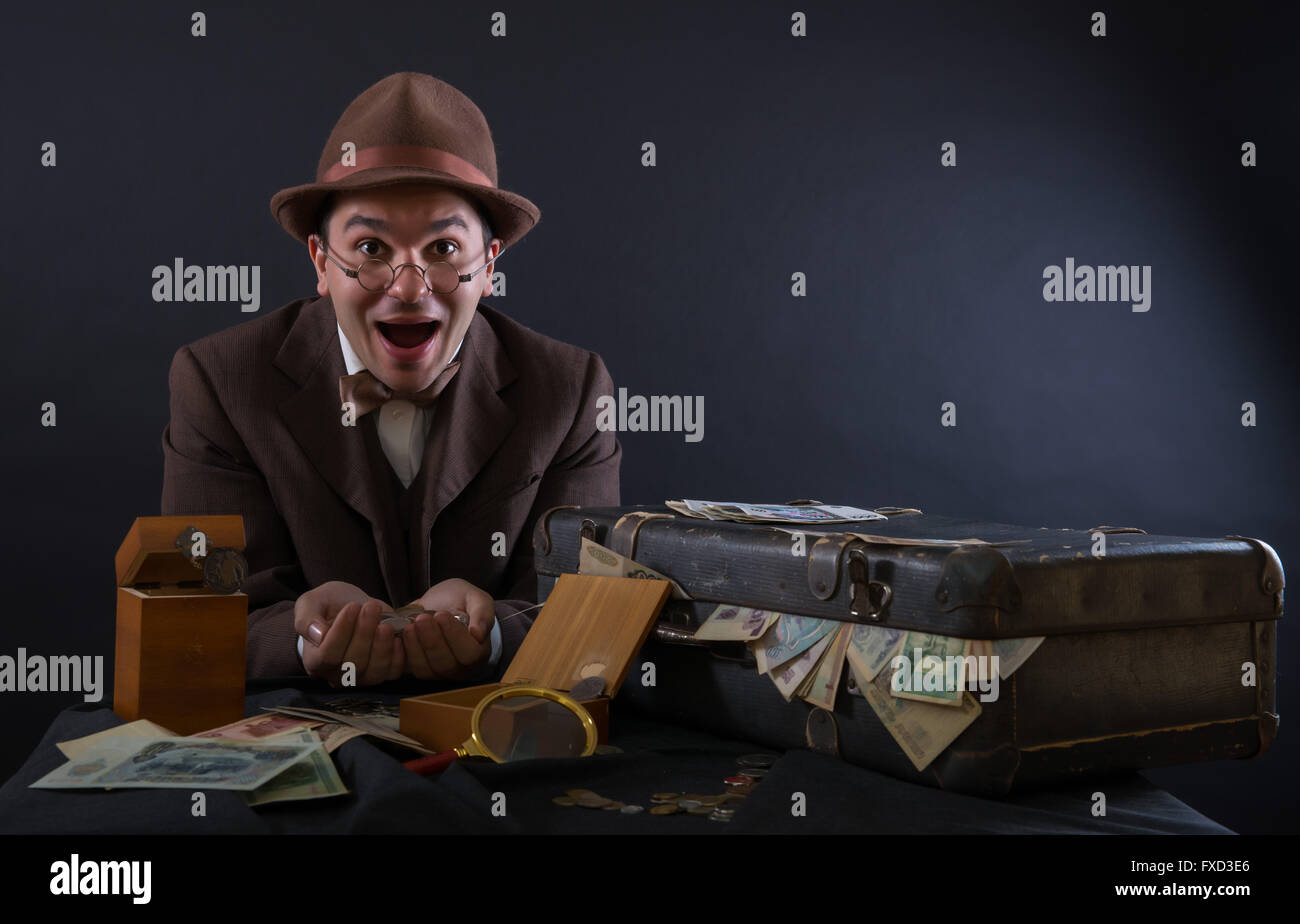 Numismatist with his coin collection Stock Photo - Alamy