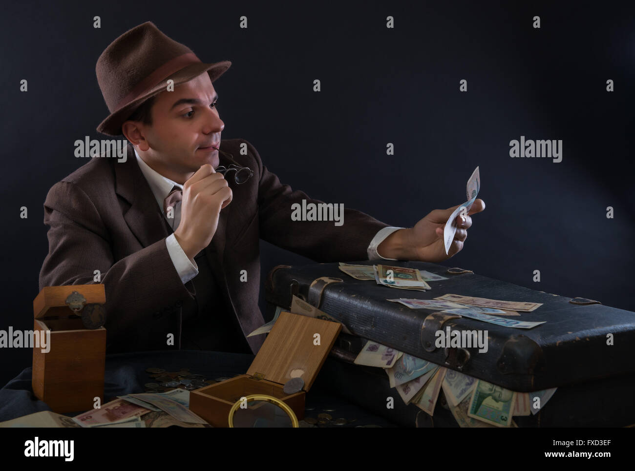Numismatist with his coin collection Stock Photo - Alamy