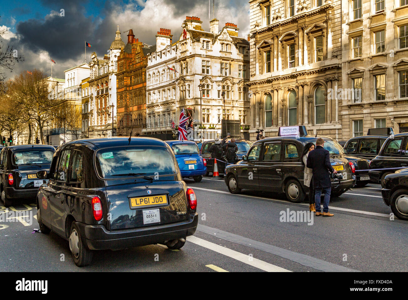 A London Taxi Drivers Association protest against Uber in London. Black ...