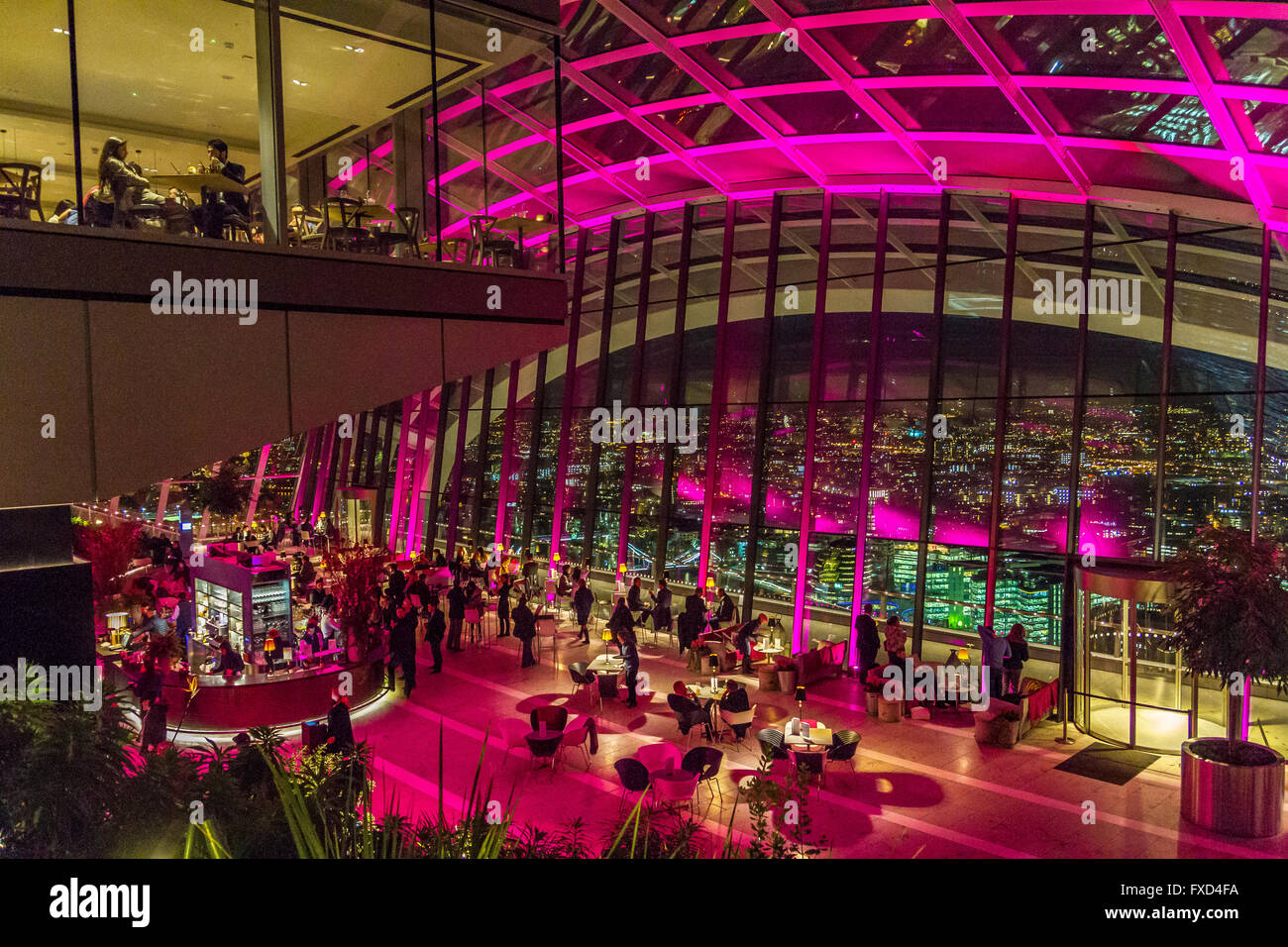 People At The The Sky Garden Enjoying Evening Drinks At The Sky Pod Bar people-at-the-the-sky-garden-enjoying-evening-drinks-at-the-sky-pod-bar