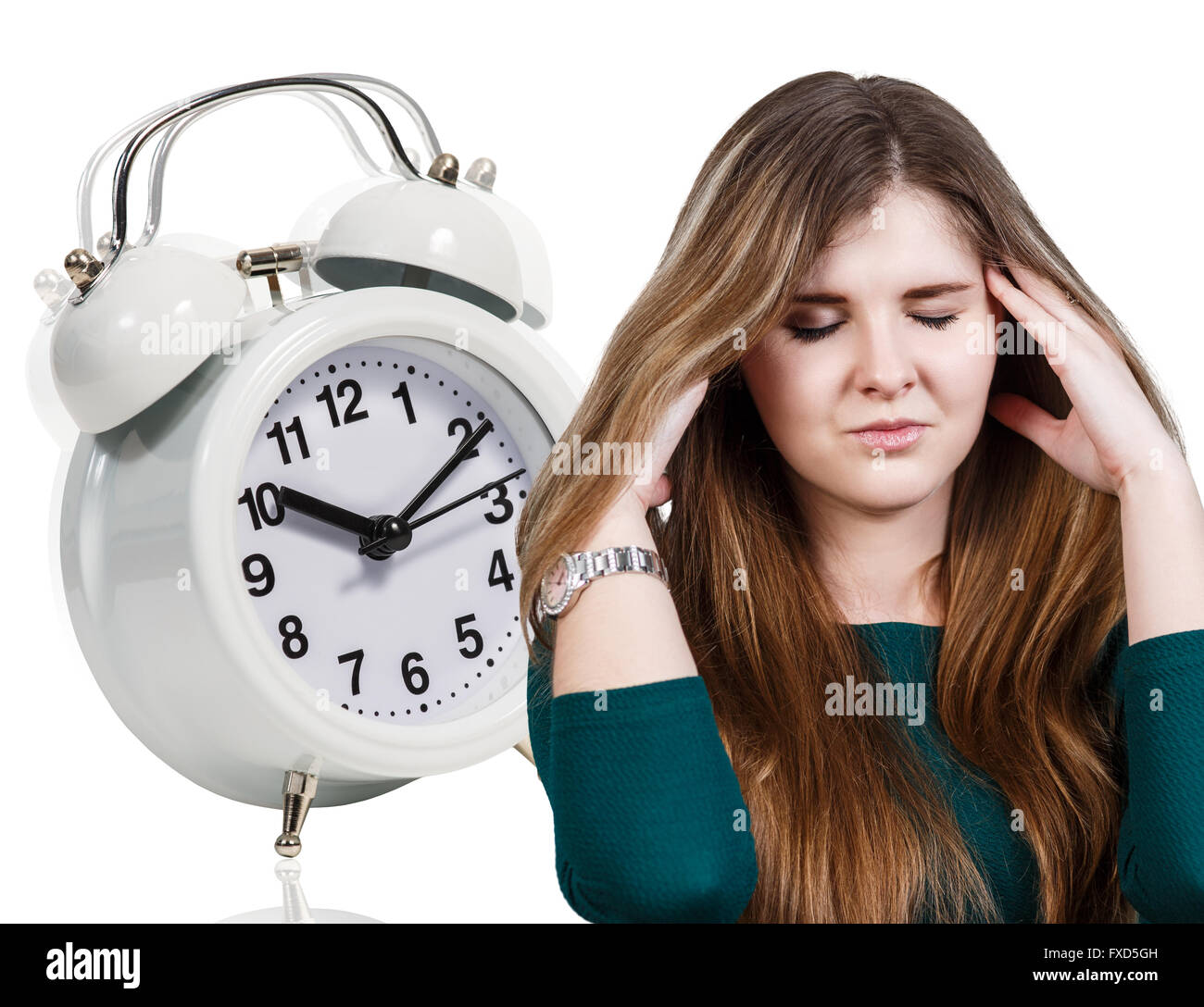Woman with a headache and alarm clock Stock Photo - Alamy
