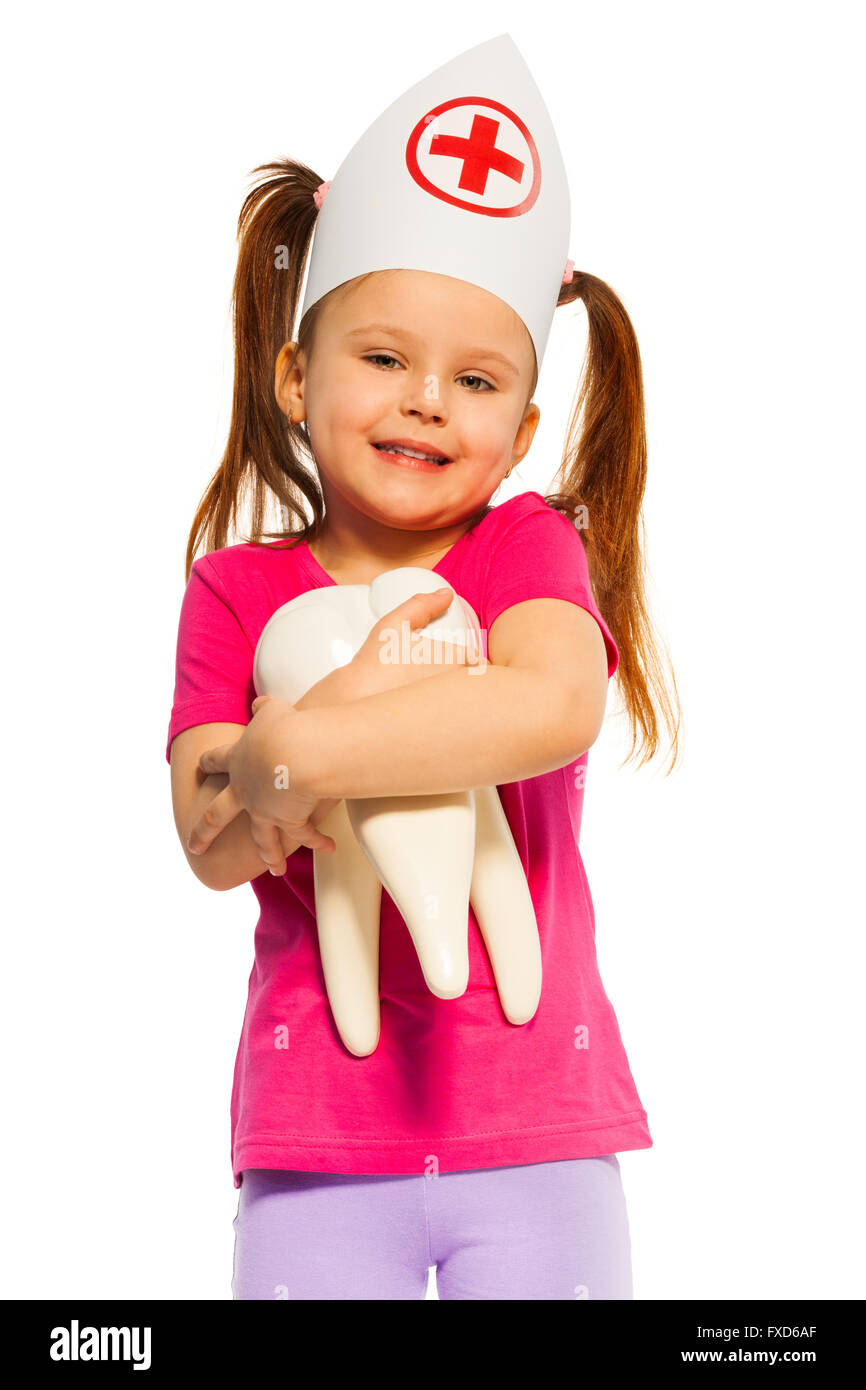 Funny little doctor with big tooth model Stock Photo - Alamy