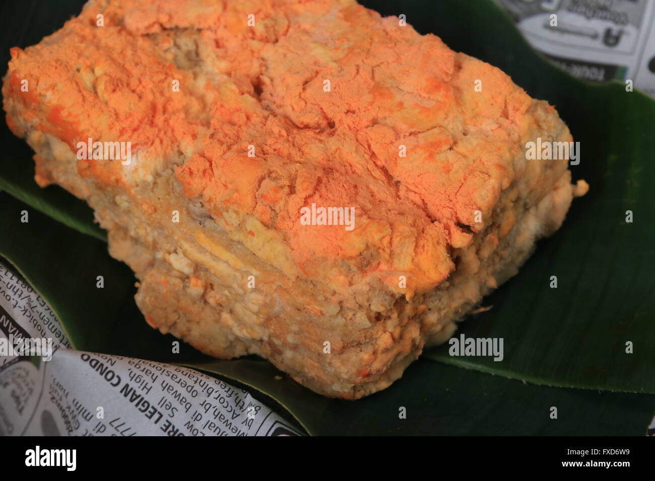 Oncom, fermented by-products of tofu and tempeh making, lined with ...