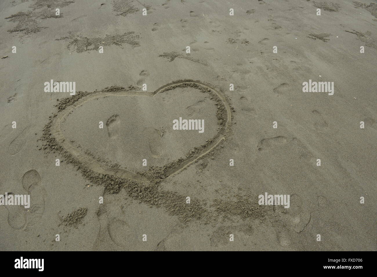 Sandy beach of Graffiti Stock Photo - Alamy