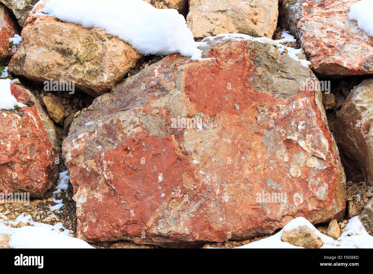 Fragment of a wall from a chipped stone in Alps mountains Stock Photo ...