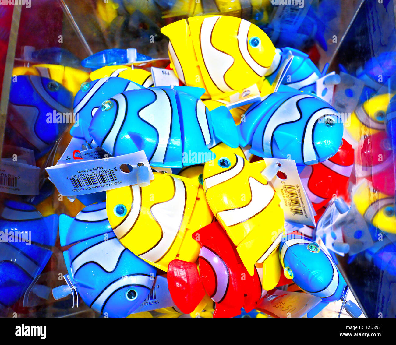 Red blue green yellow clockwork clown fish Stock Photo - Alamy