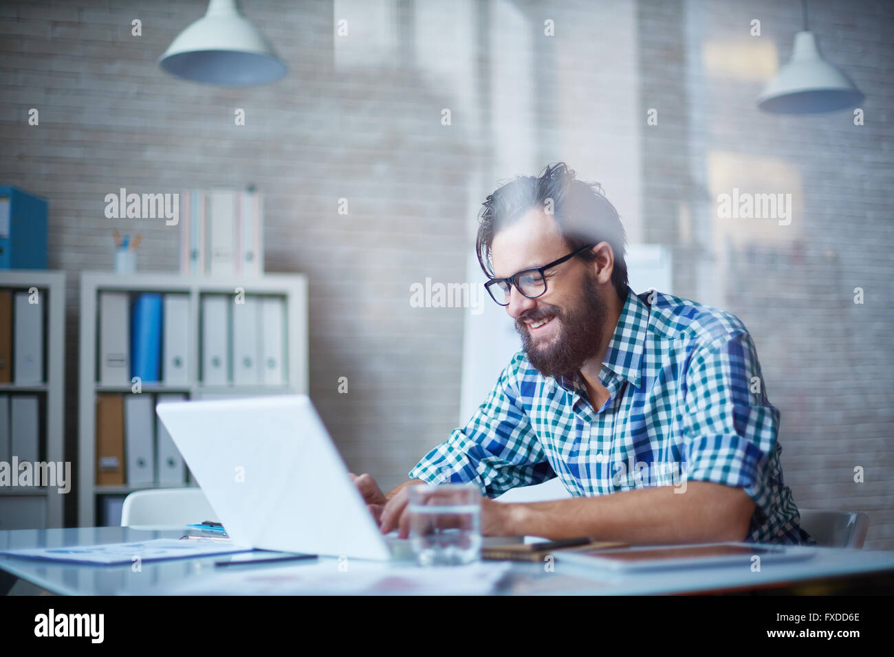 Cheerful business worker Stock Photo - Alamy