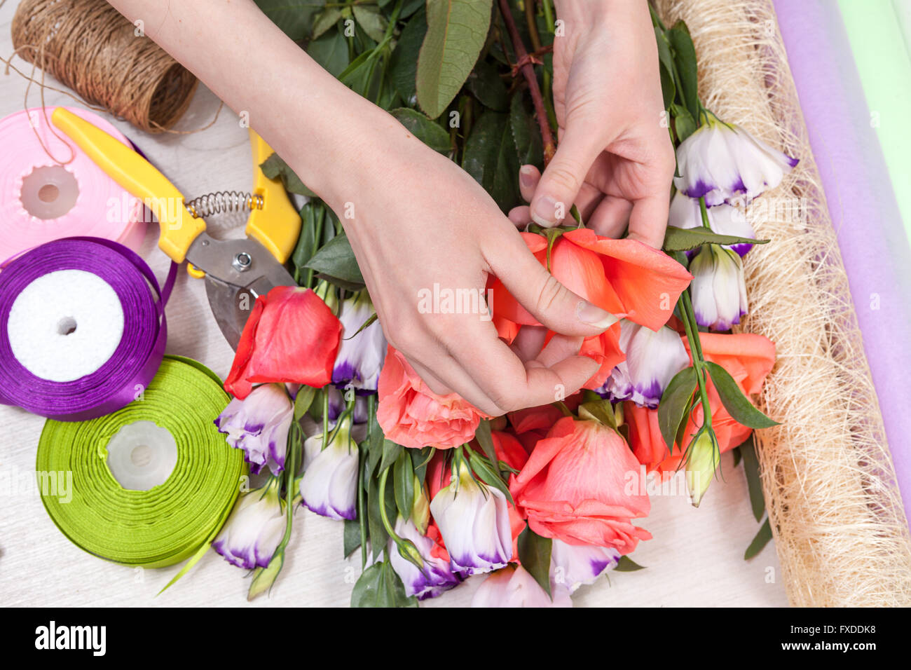 Florist at work with flowers Stock Photo - Alamy