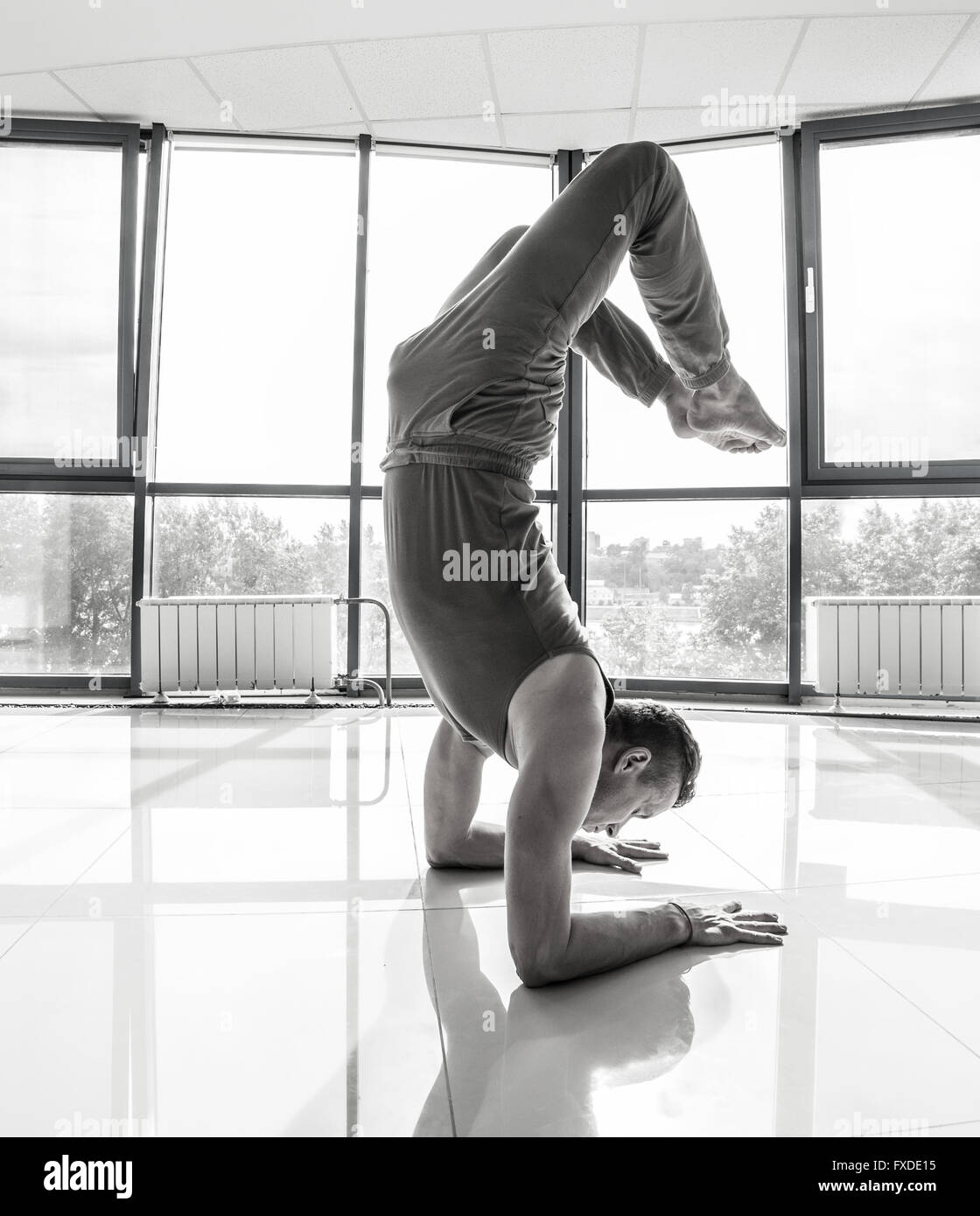 Beginner male yoga hi-res stock photography and images - Alamy