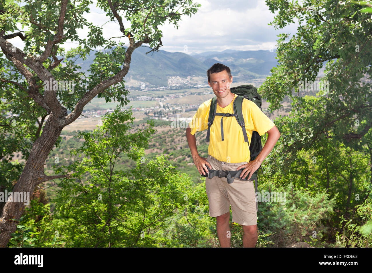Backpacker in the forest Stock Photo - Alamy