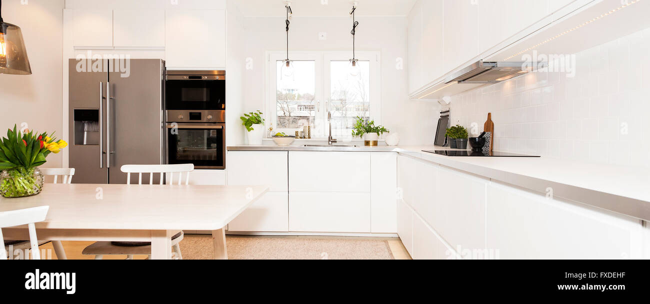Fancy kitchen interior in scandinavian design Stock Photo - Alamy