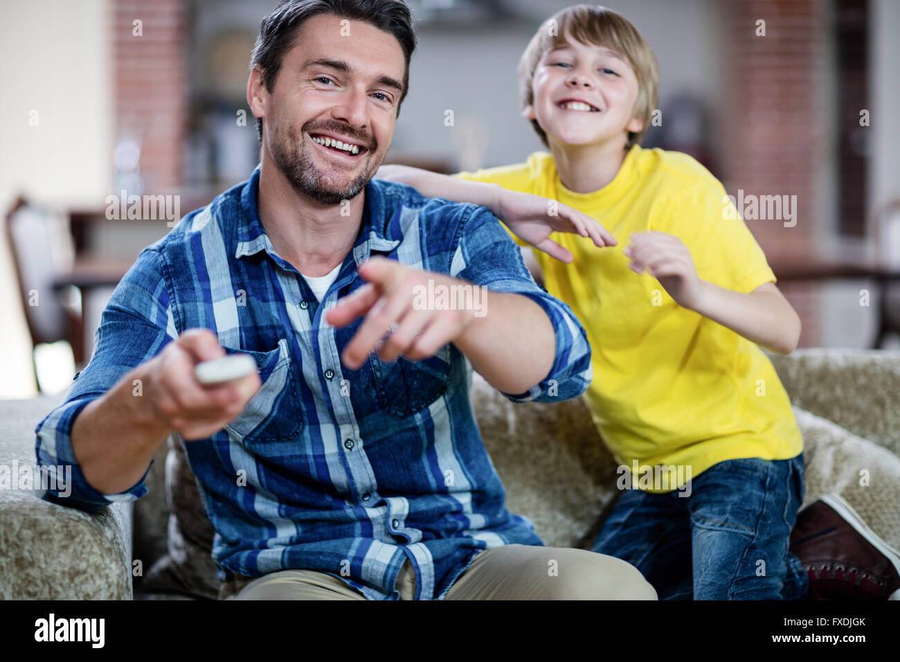 Father watching tv son hi-res stock photography and images - Alamy