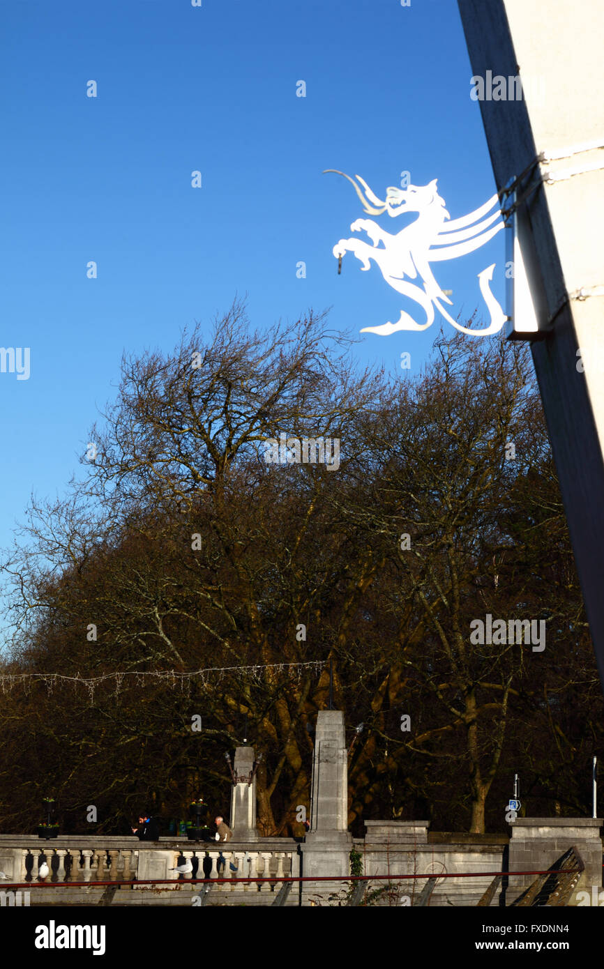 Welsh dragon symbol on Millennium Walk, winter trees in Bute Park ...