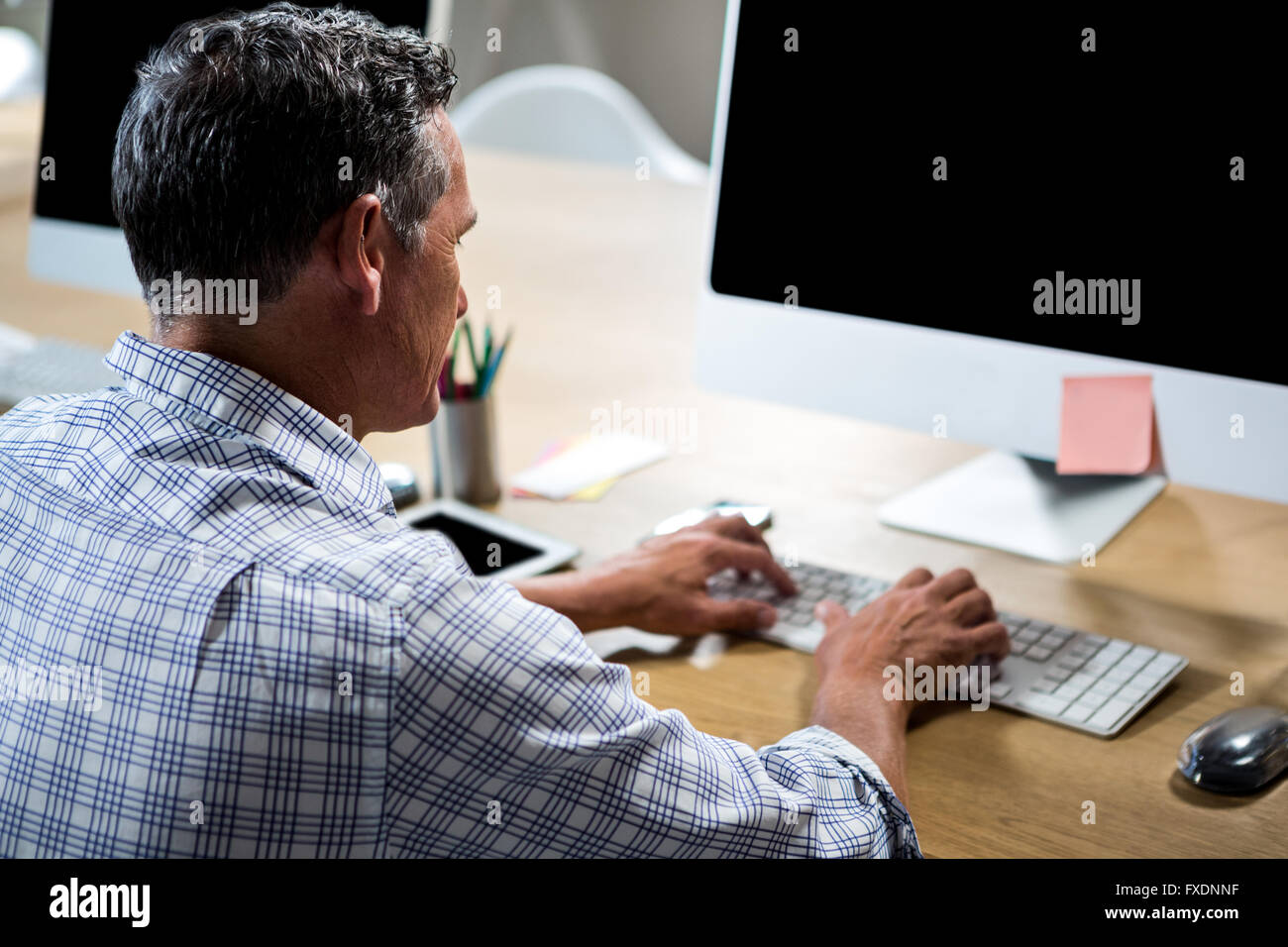 Man typing on desktop computer hi-res stock photography and images - Alamy