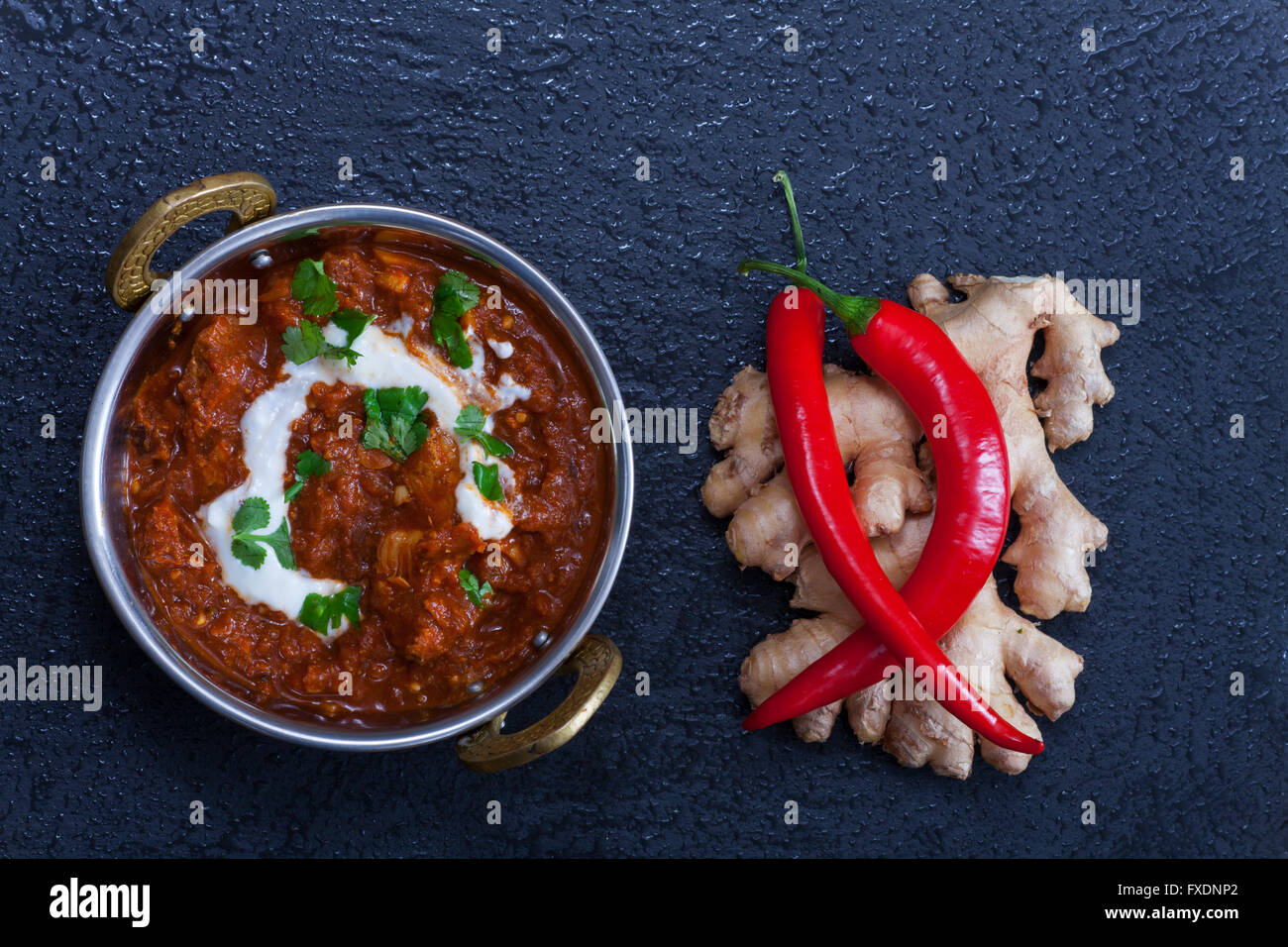 indian chicken curry in a pot Stock Photo - Alamy
