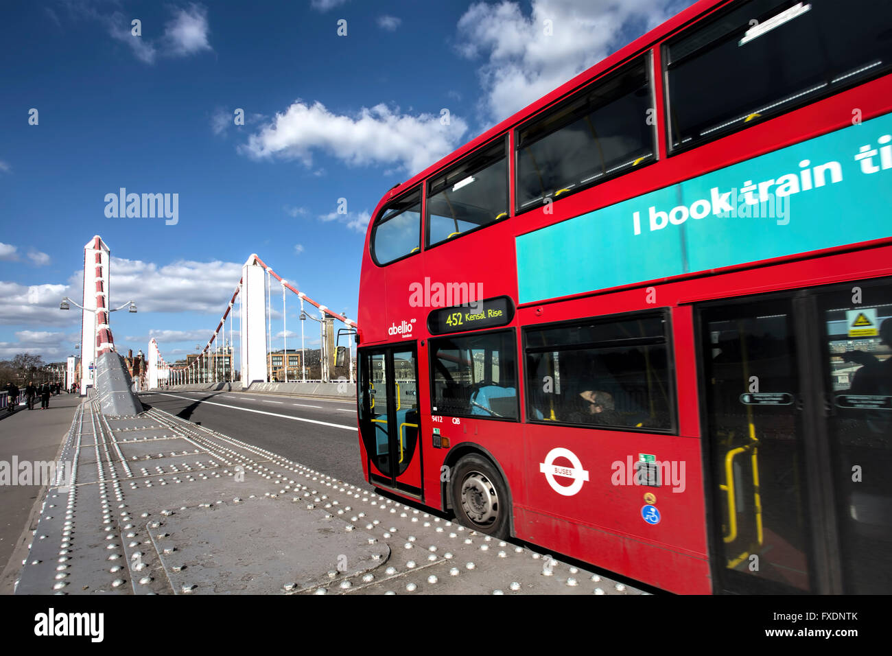Bus crosses Chelsea Bridge over River Thames London England Stock Photo ...
