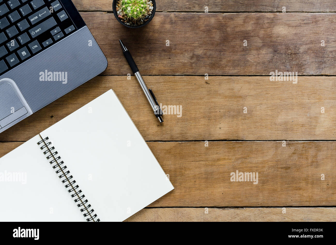 Office stuff with laptop, pen , and leather notebook.Top view with copy ...