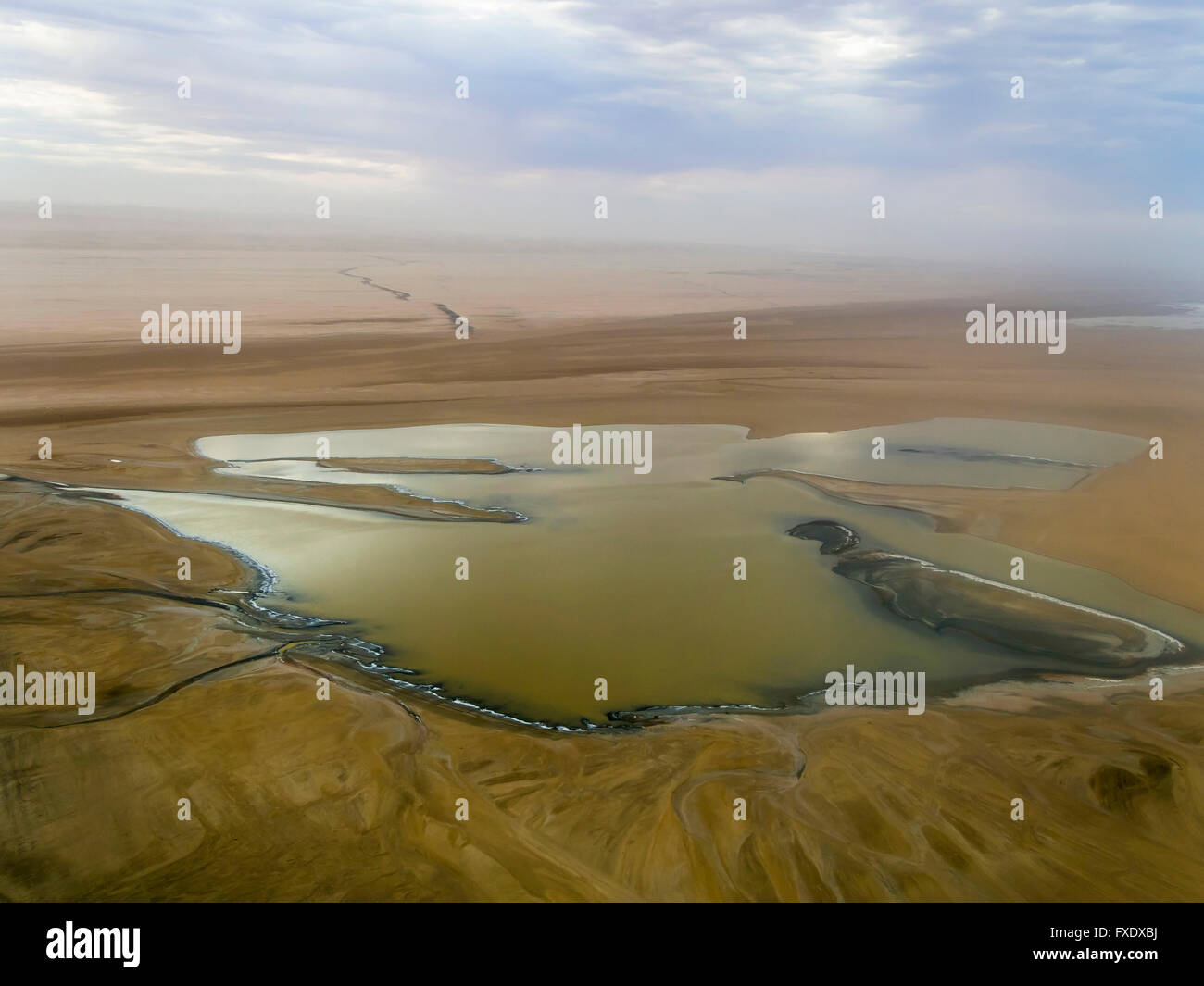Aerial view, low coastal dunes with salt lake, at Walvis Bay, Namib ...