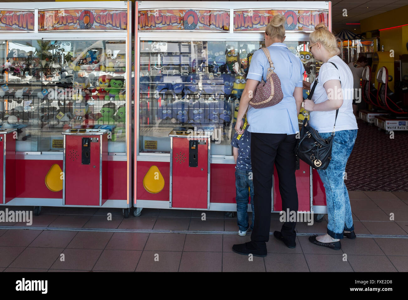 Two women at amusement arcade, Margate, Kent, UK Stock Photo - Alamy