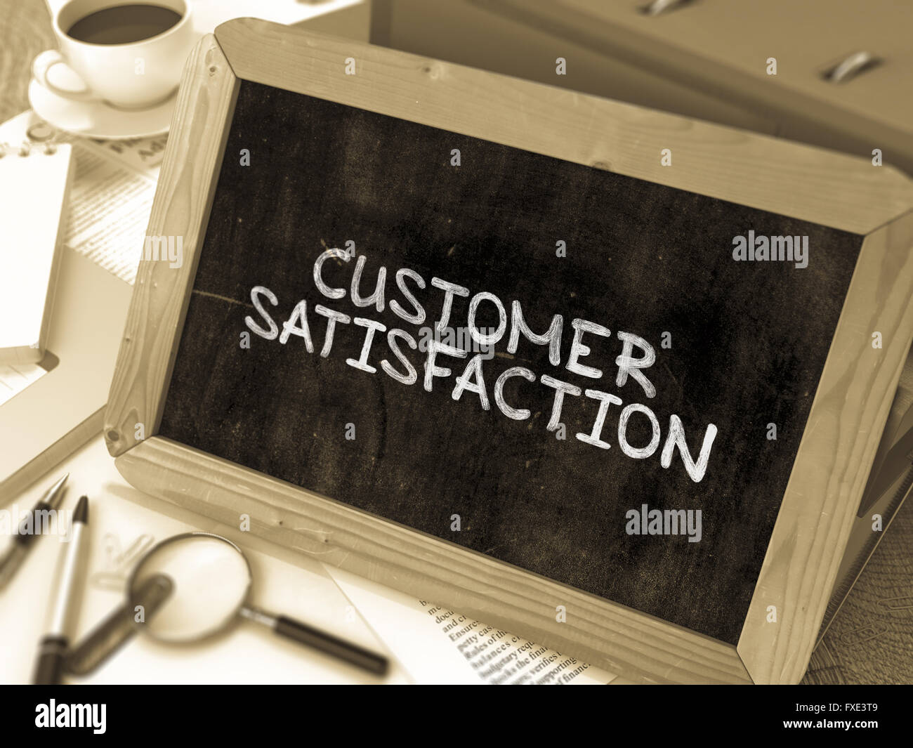 Handwritten Customer Satisfaction on a Chalkboard Stock Photo - Alamy