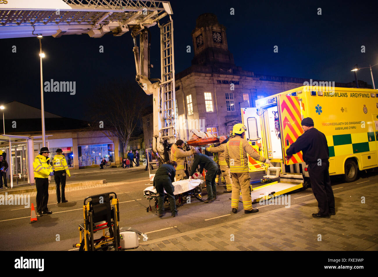 999 emergency services: ambulance and fire engine using an extending ...